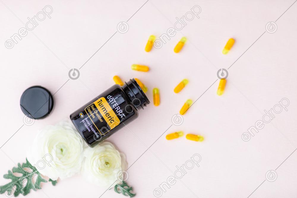 Turmeric Dual Chamber Capsules on Pink Background with White by Jessica ...