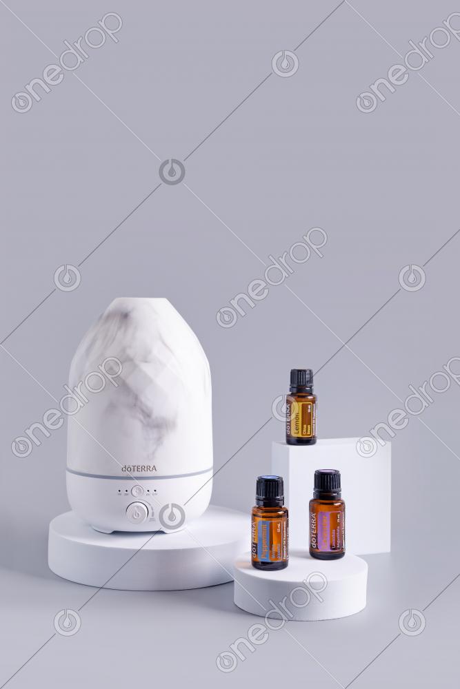 White marble diffuser VOLO on podium stage with top essentia by Kseniia Che