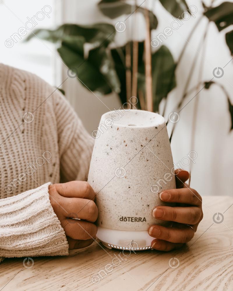 Roam Diffuser Lifestyle Picture With Hands by Meg Spoelstra